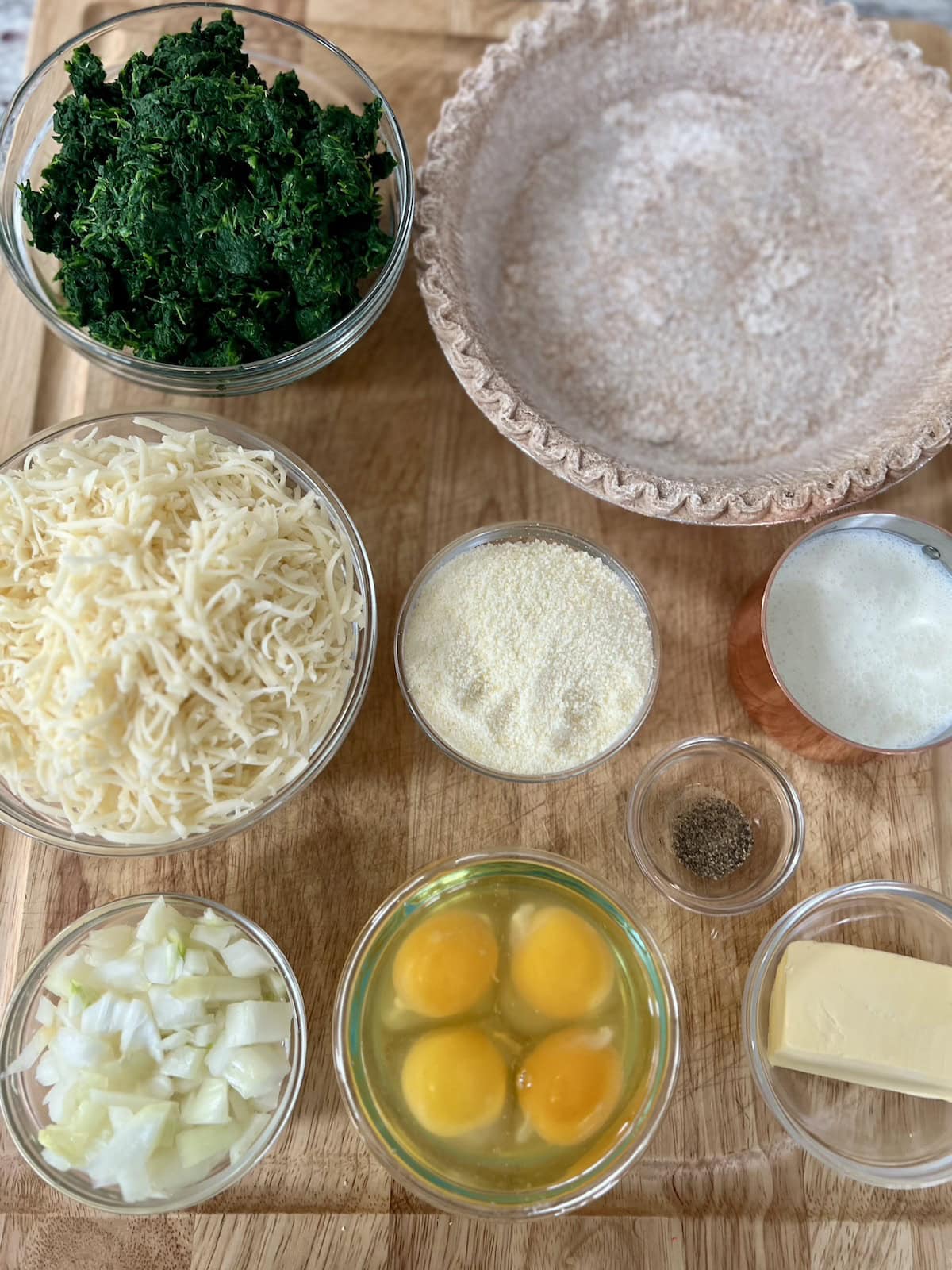 Easy Spinach Swiss Quiche with Frozen Pie Crust - Mangia with Michele